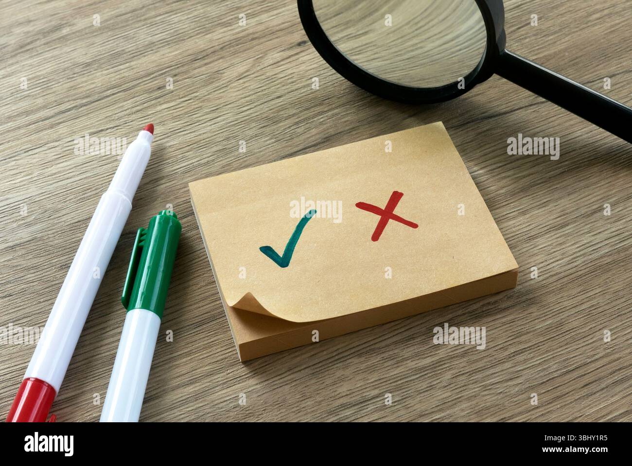 Checklist with Green Check Mark and Red Cross on Sticky Note with Pens ...