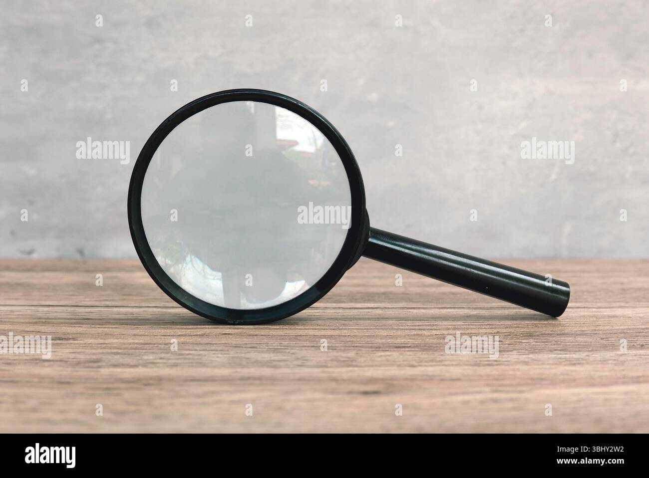 Magnifying Glass on Wooden Table, Perfect for Detailed Exploration and ...