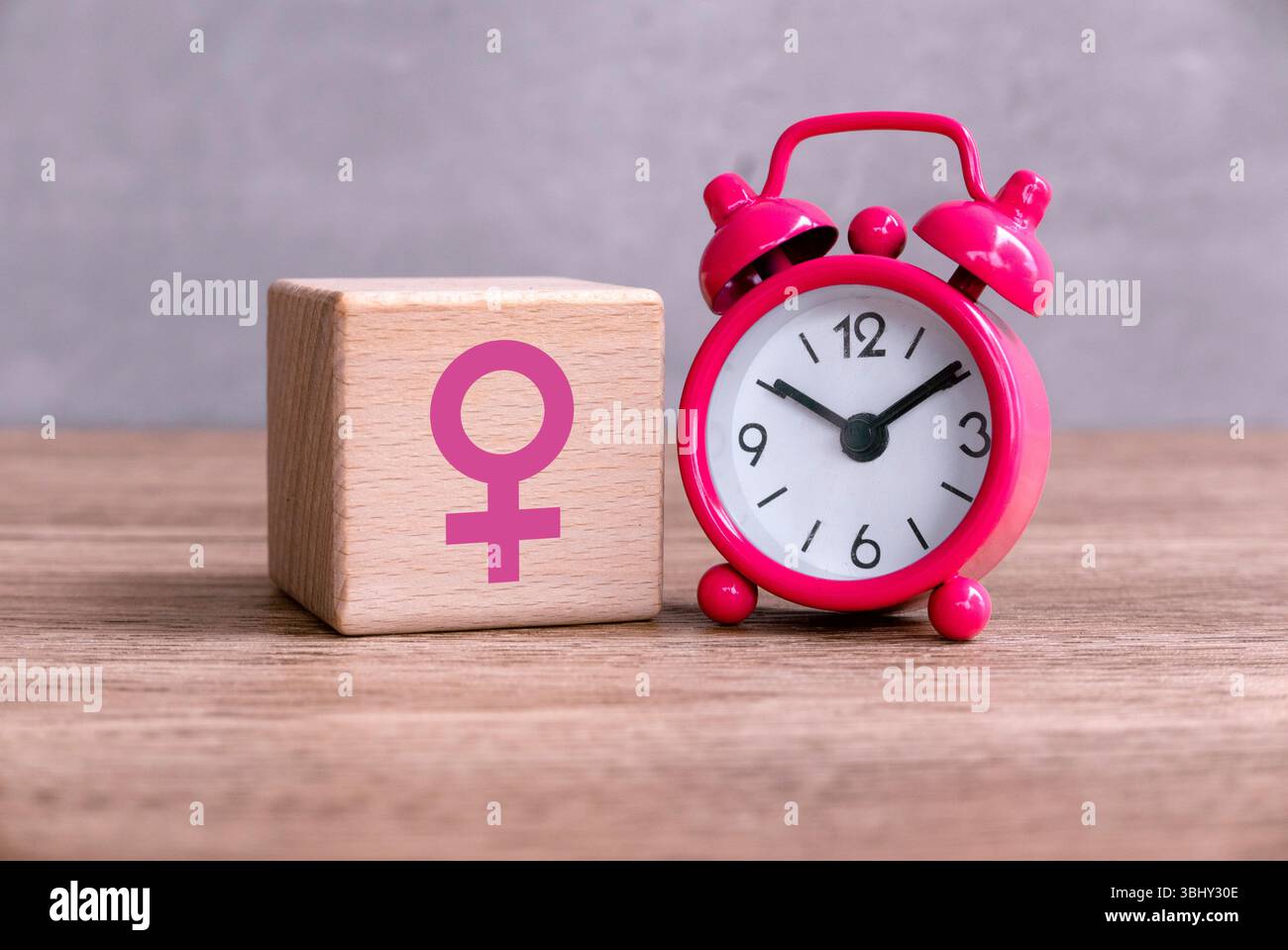 Menopause concept. Women symbol over a watch. Healthcare and medical ...