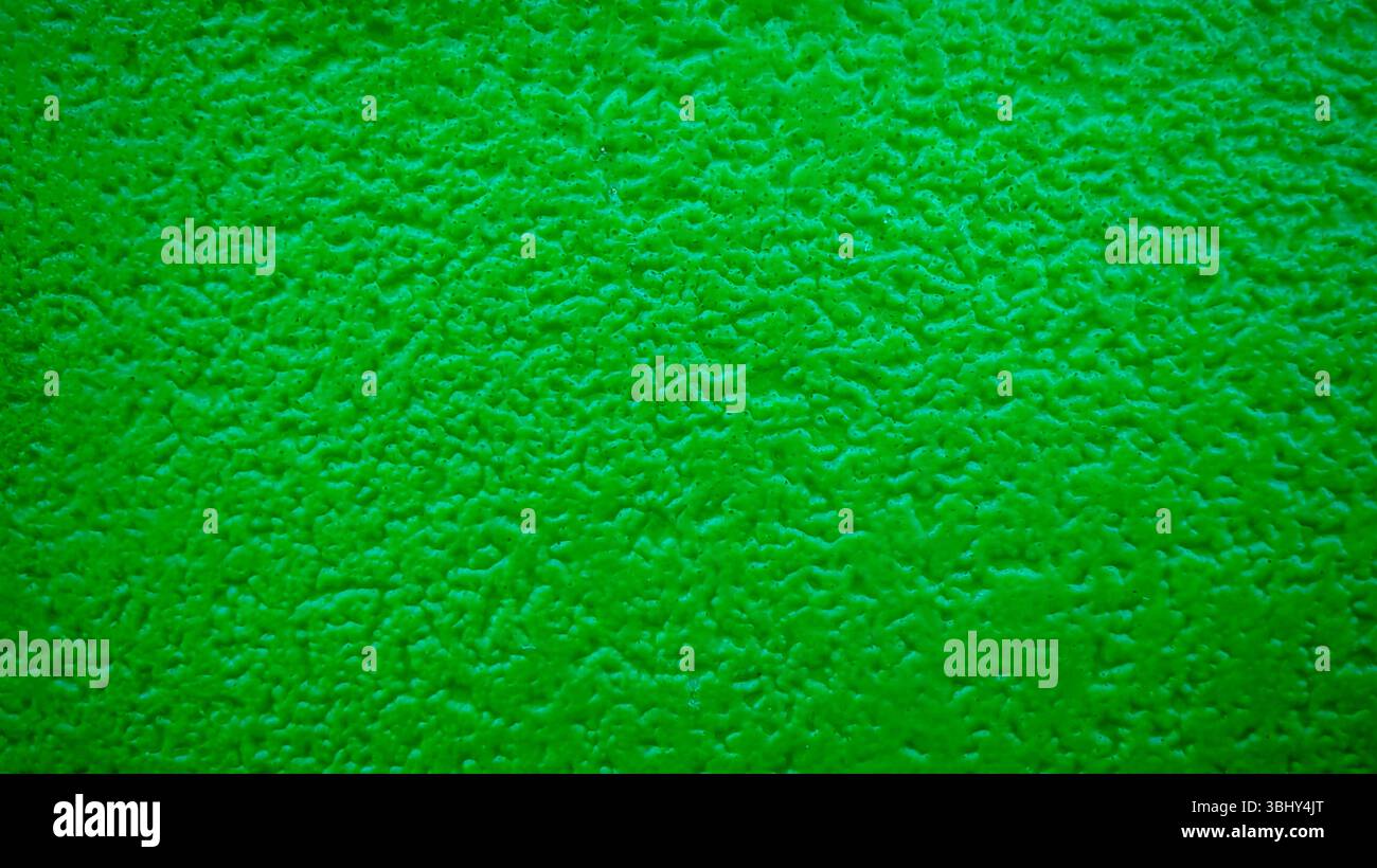 Textured Green Surface with Uneven Patterns and Shades Stock Photo - Alamy