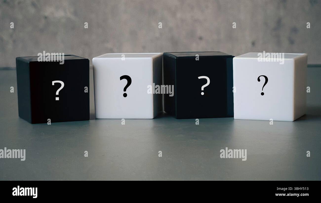 Question and answer concept. Stack of black and white cube with a ...