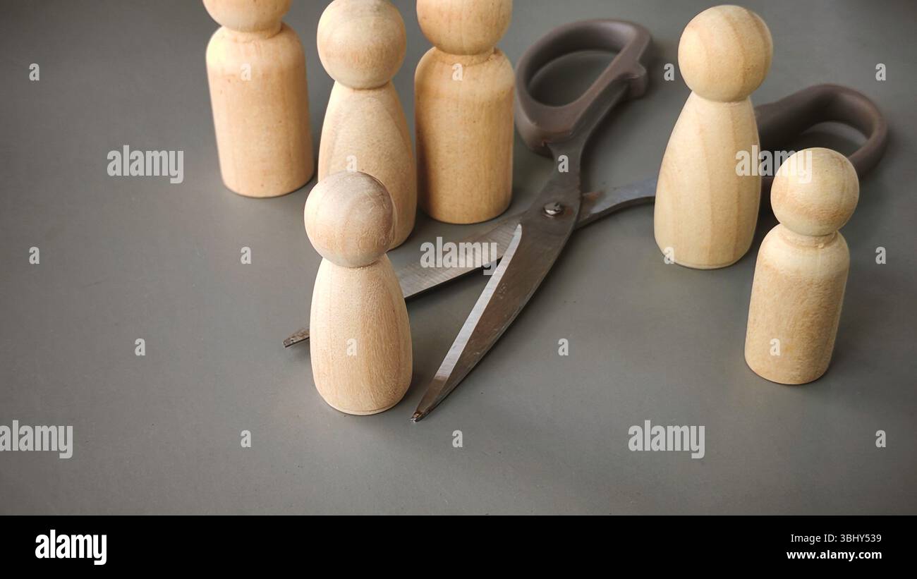 Scissors and Wooden People Representing Separation, Decision-Making ...