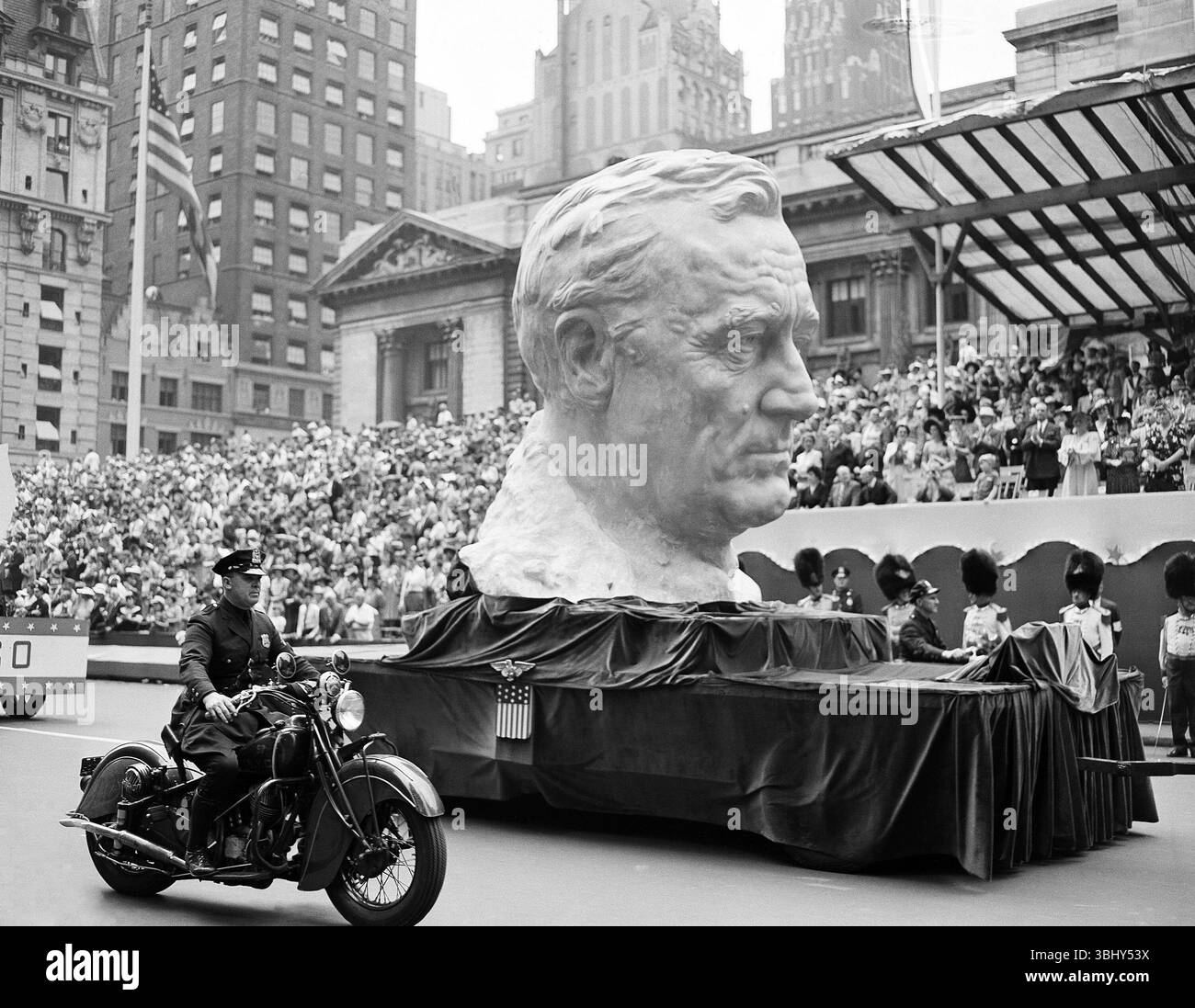 FILE - A float carrying a huge bust of President Franklin Roosevelt ...