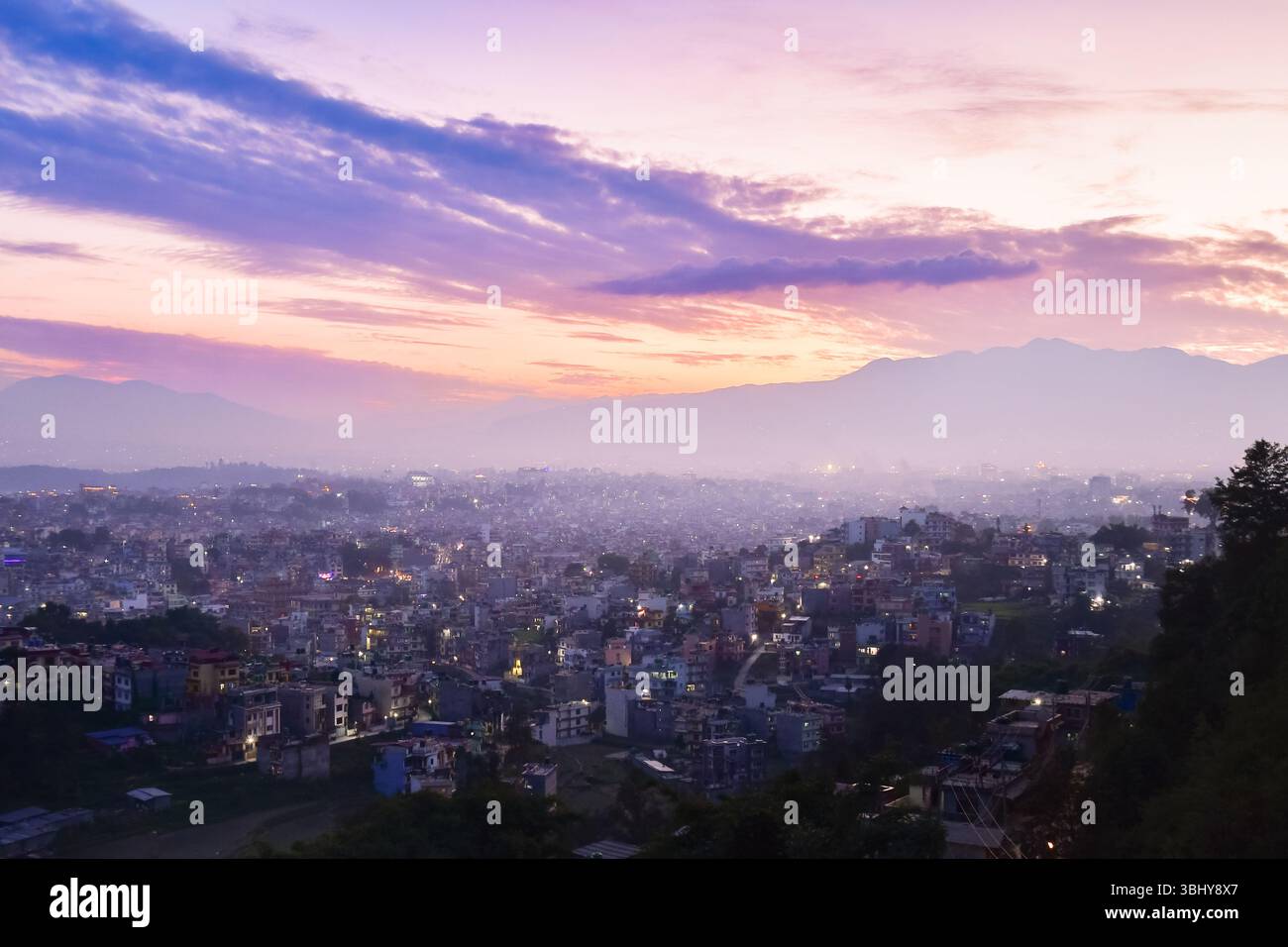 Expansive panoramic sunset view over Kathmandu, Nepal, with dense urban ...