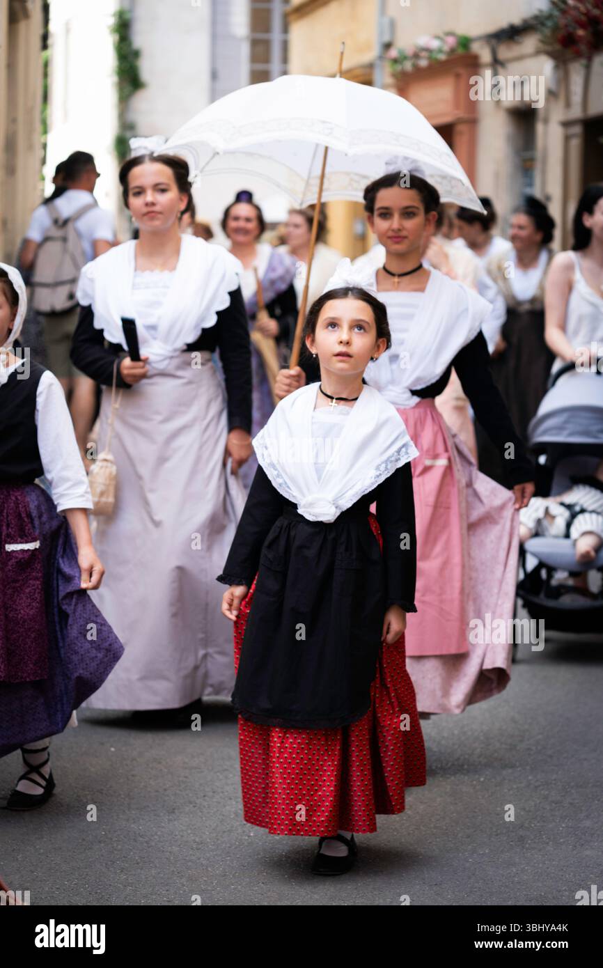 Children dressed in period clothes parade through the ancient medieval ...