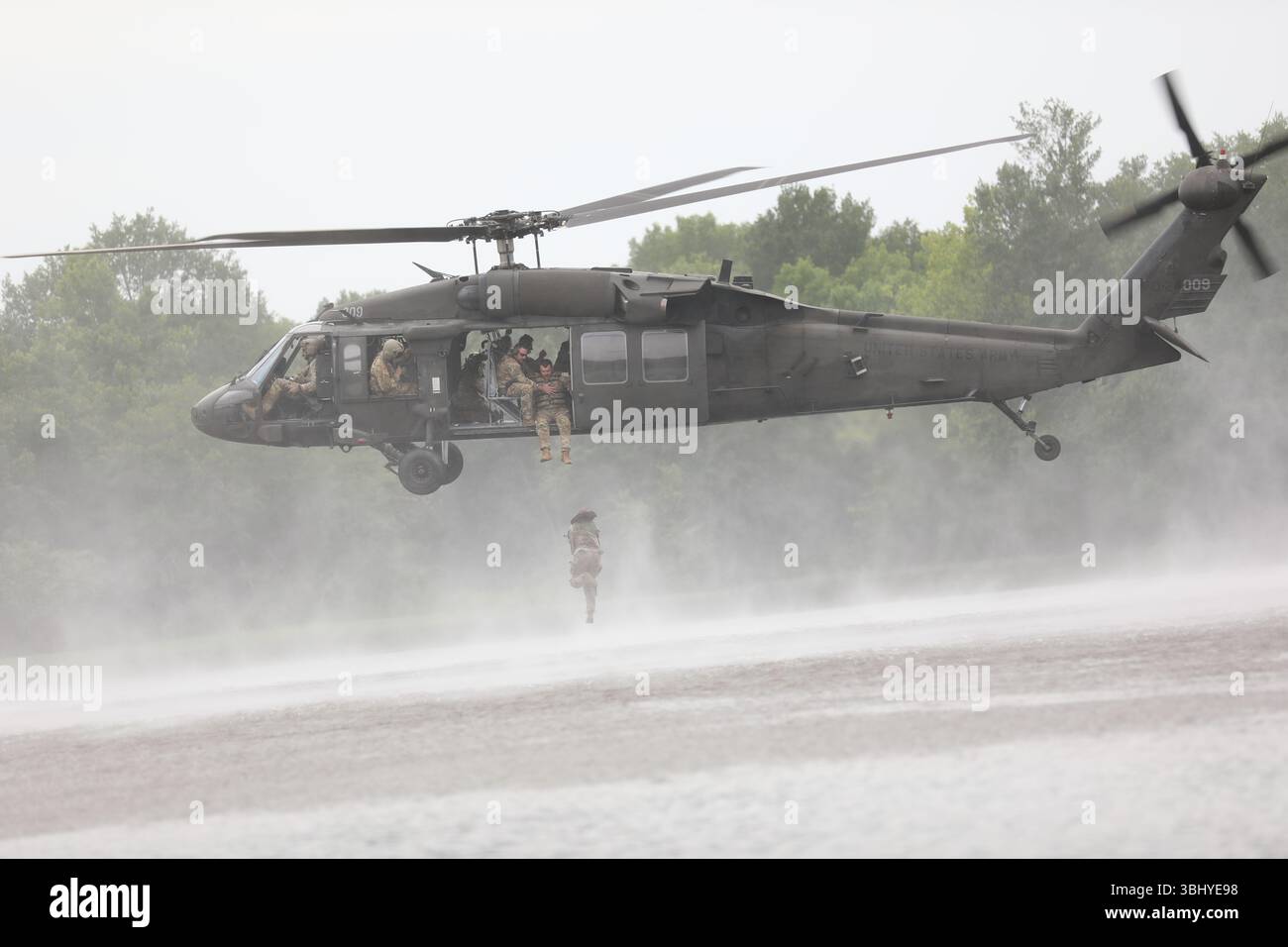 U.S. Army soldiers, of the 467th Engineer Battalion, conduct helocast ...