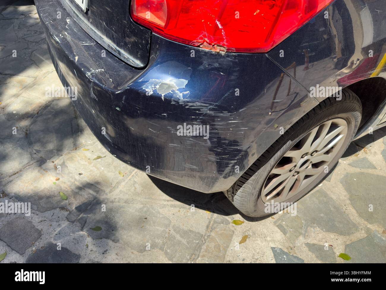 Paint damage scratches on a black car in the parking area Stock Photo ...