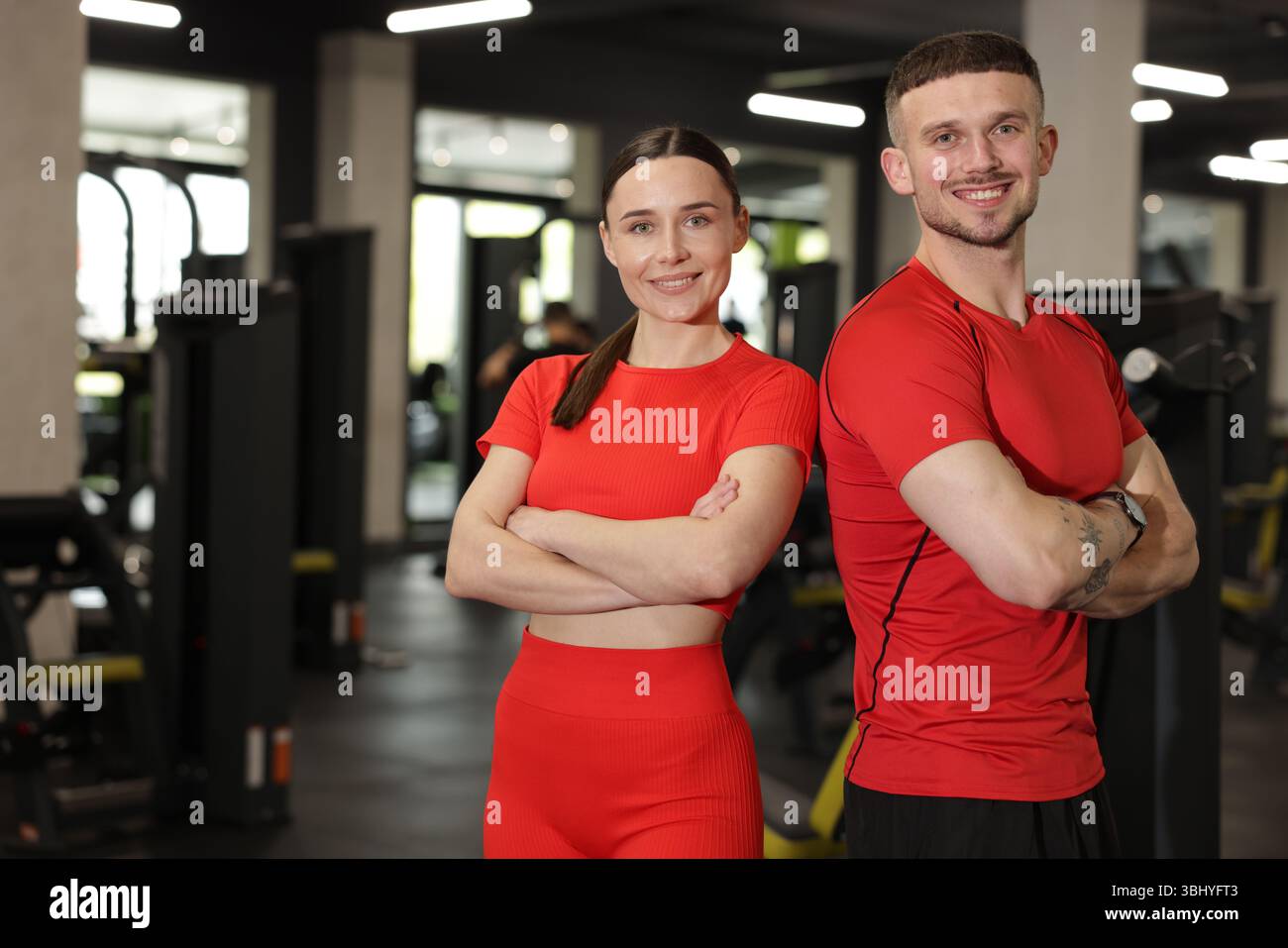 Portrait of professional personal trainers in gym Stock Photo - Alamy