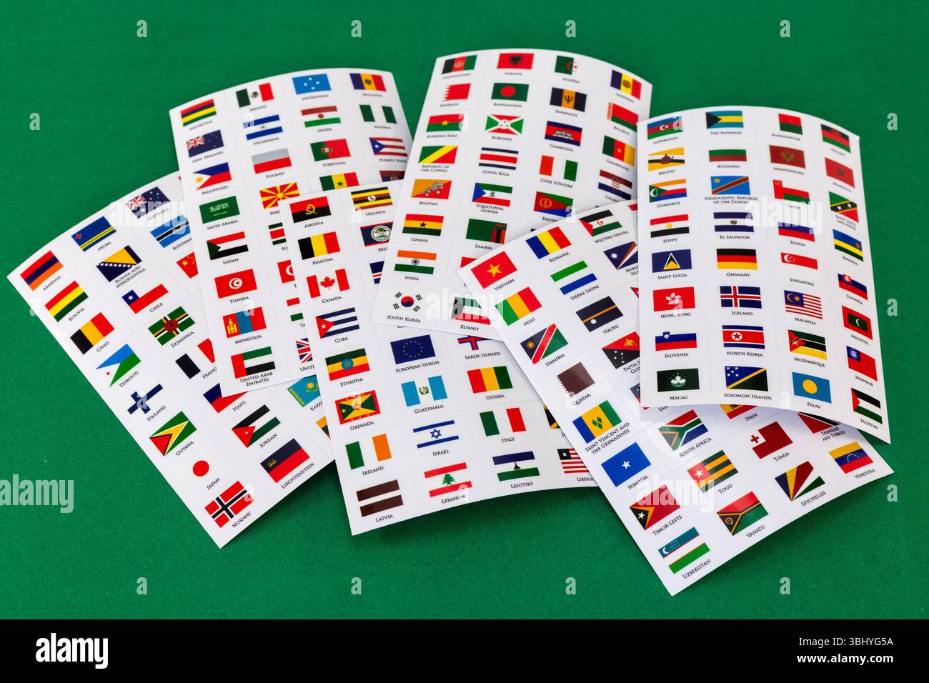 National flags of different countries.on green background Stock Photo ...
