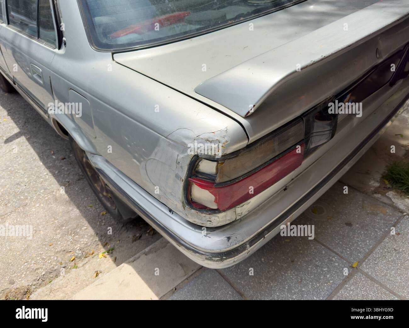 Paint damage scratches on a silver car in the parking area Stock Photo ...