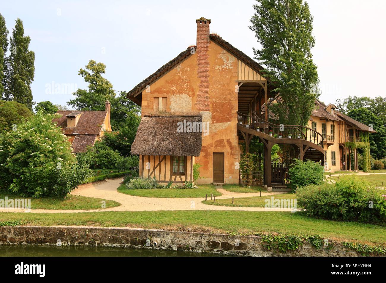 The Queen's Hamlet is a rustic retreat in the park of the Palace of ...