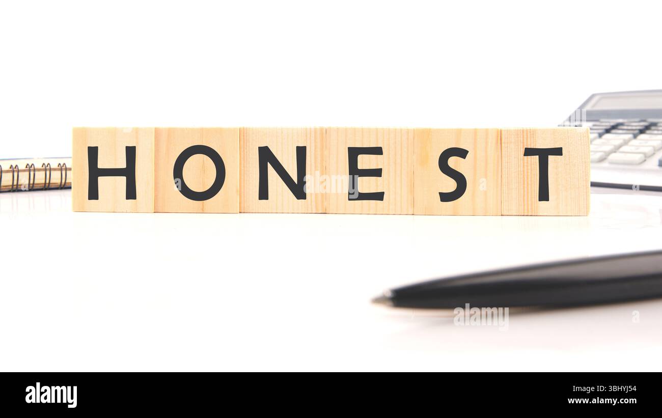 The concept word HONEST is assembled from cubes. Business integrity ...