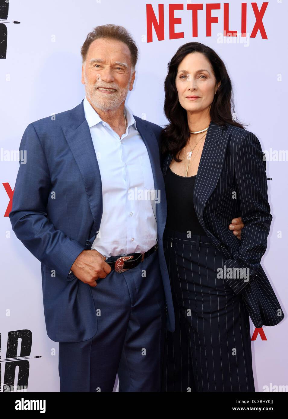 Arnold Schwarzenegger and Carrie-Anne Moss at Netflix's 'Fubar' Season ...