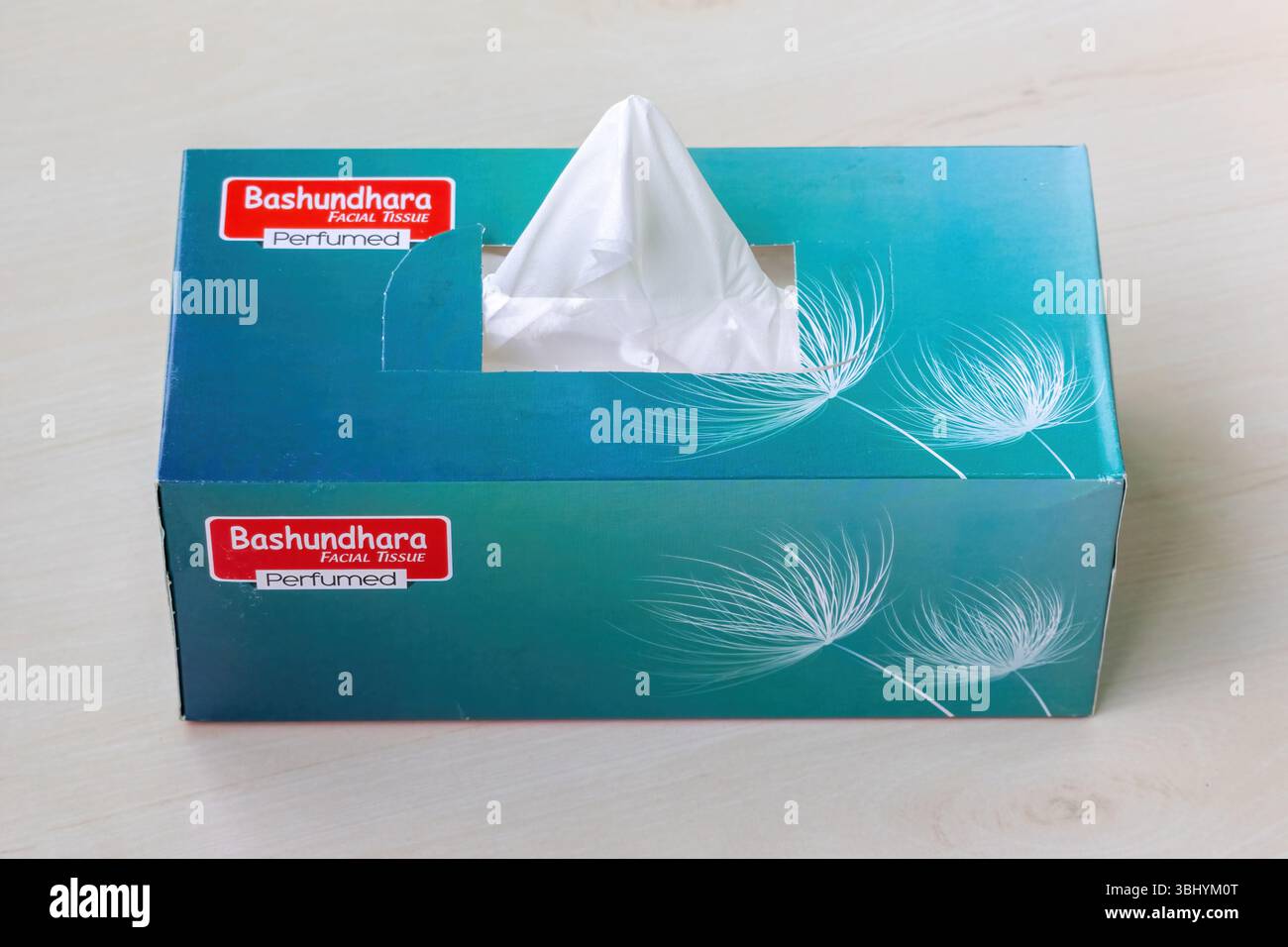Bashundhara perfumed facial tissue paper in its package on a light wooden surface Stock Photo ...