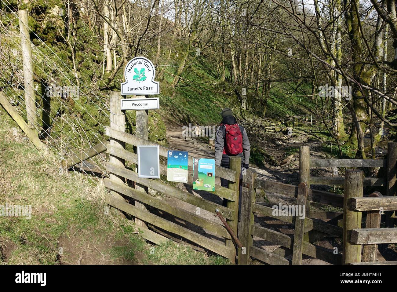 Man (Hiker) Walking by the National Trust Welcome Sign for 'Janet's ...