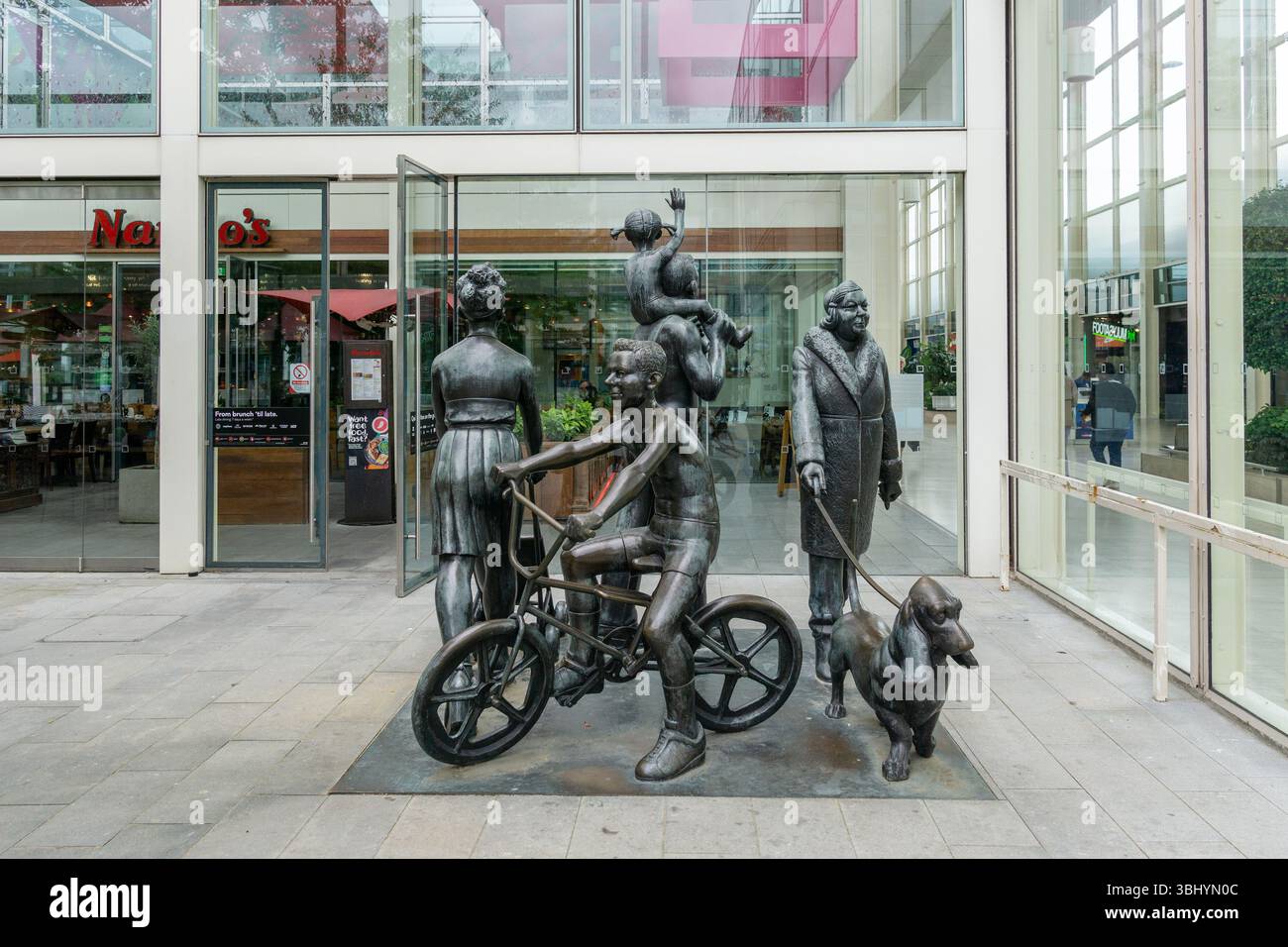 Vox Pop, a 1979 bronze sculpture by John Clinch, Queens Court, shopping ...
