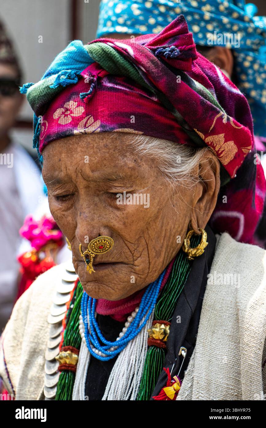 A elderly Limbu Woman participating in Ubhauli Parba festival ...