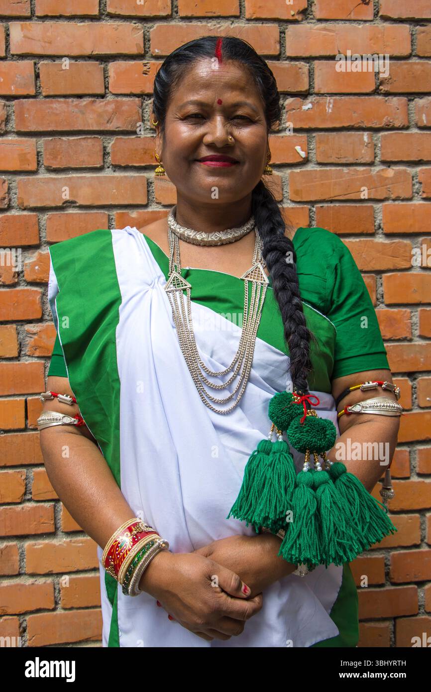 A Tharu woman wearing silver ethnic necklaces called Hansauli and ...