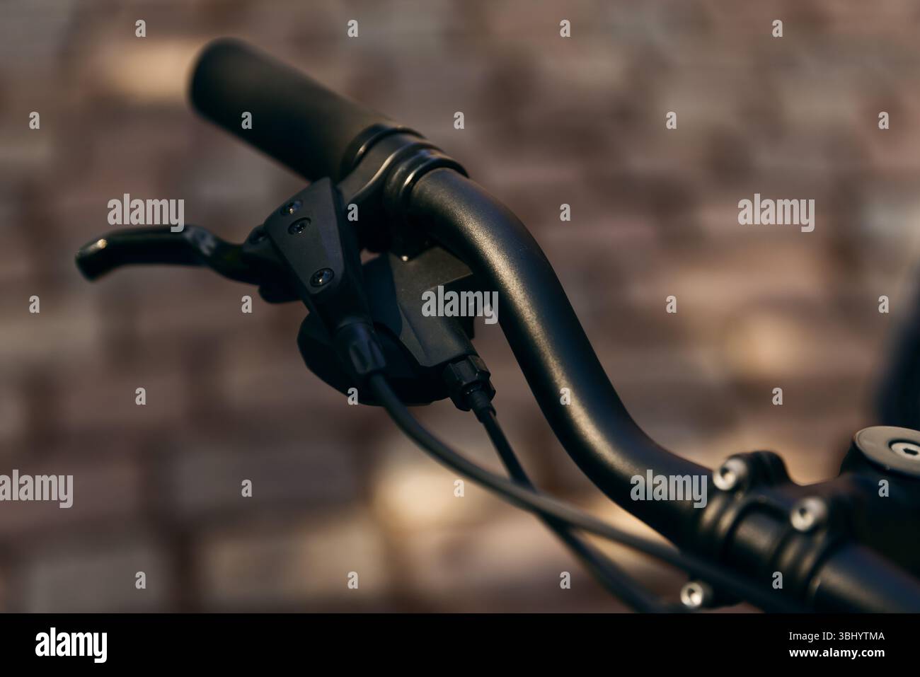 Top view closeup of black modern bicycle handle and gear shift on ...