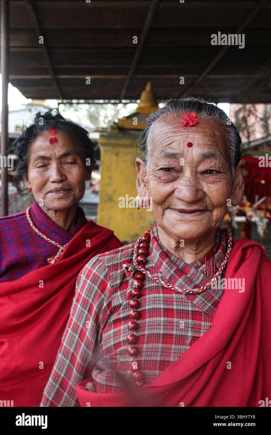 Elderly ladies of the Newar caste attend the Madhav Narayan Festival at ...