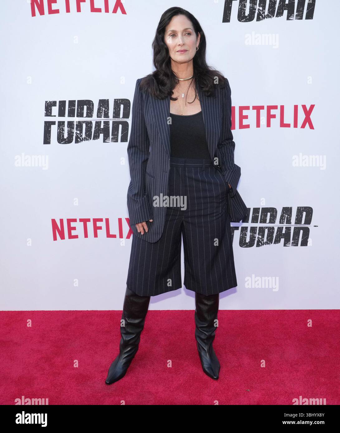 Carrie-Anne Moss arrives at the Netflix's FUBAR Season 2 Los Angeles ...