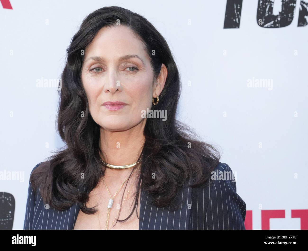 Carrie-Anne Moss arrives at the Netflix's FUBAR Season 2 Los Angeles ...