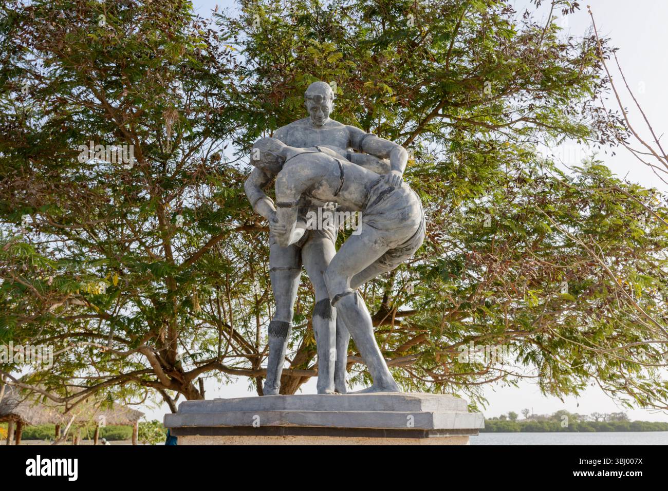 Statue of Senegalese wrestlers at Joal-Fadioth (Joal-Fadiot), an island ...