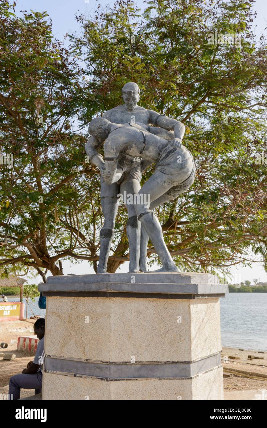 Statue of Senegalese wrestlers at Joal-Fadioth (Joal-Fadiot), an island ...