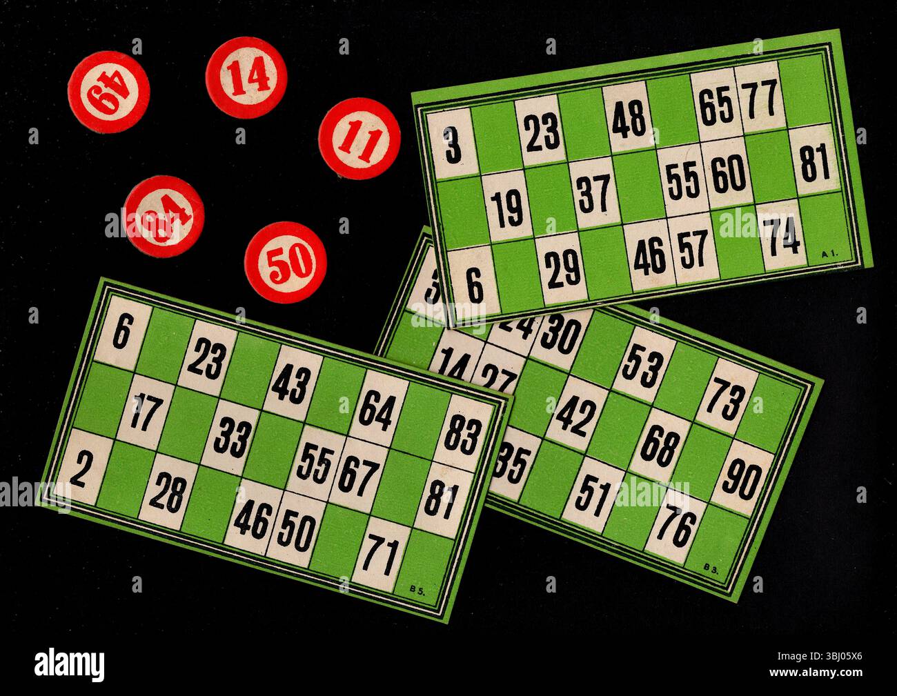 Vintage lotto or bingo cards with counters on a black background Stock ...