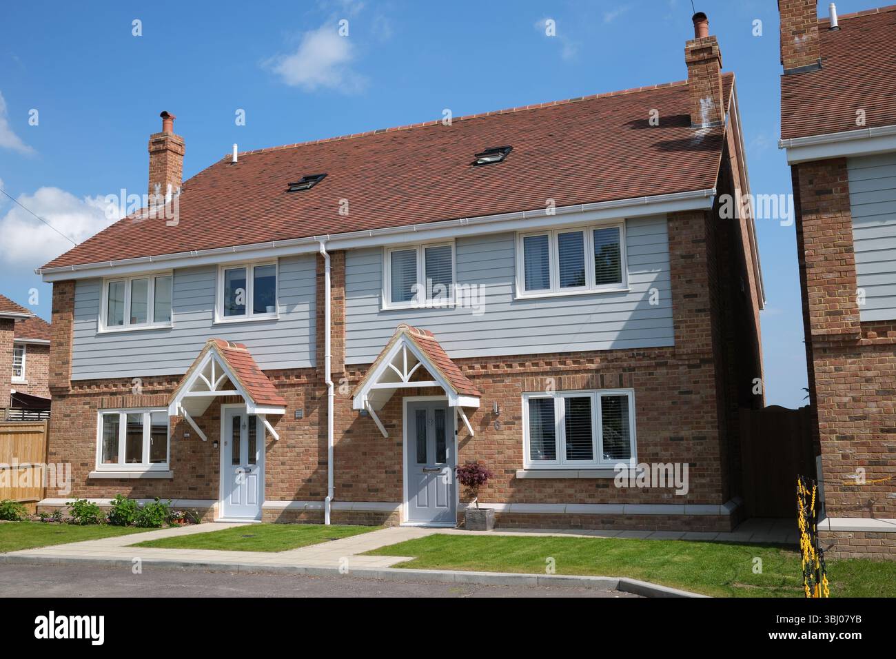 Brick clad houses hi-res stock photography and images - Alamy