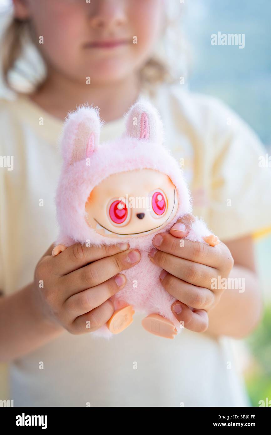 Budva, Montenegro - June 12, 2025: Close-up of pink Dada figure from ...