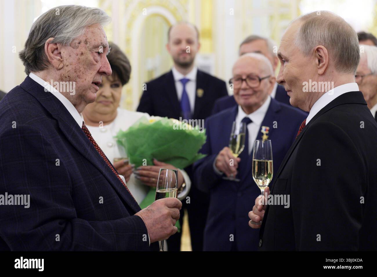 Russian President Vladimir Putin, right, speaks with Russian writer ...