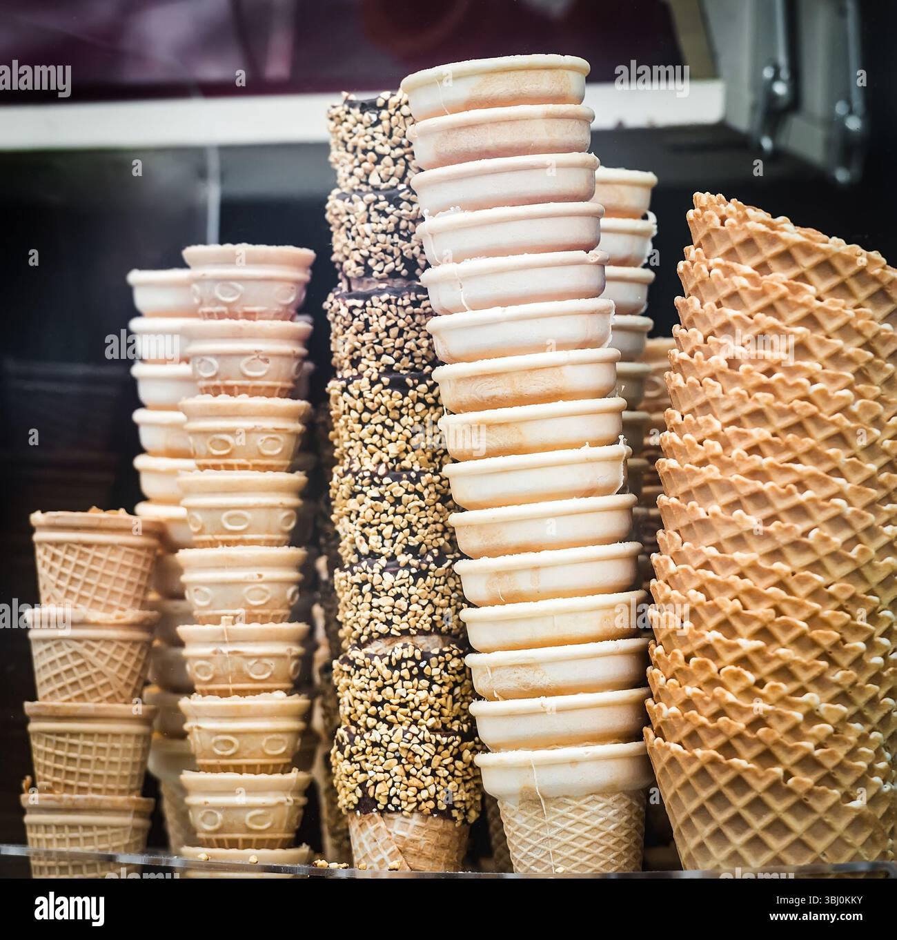 stack of empty waffle ice cream cones of different kind Stock Photo - Alamy