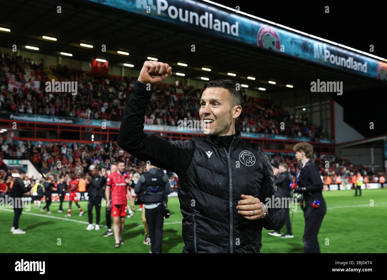 Walsall's manager Matt Sadler celebrates after the Sky Bet League Two ...