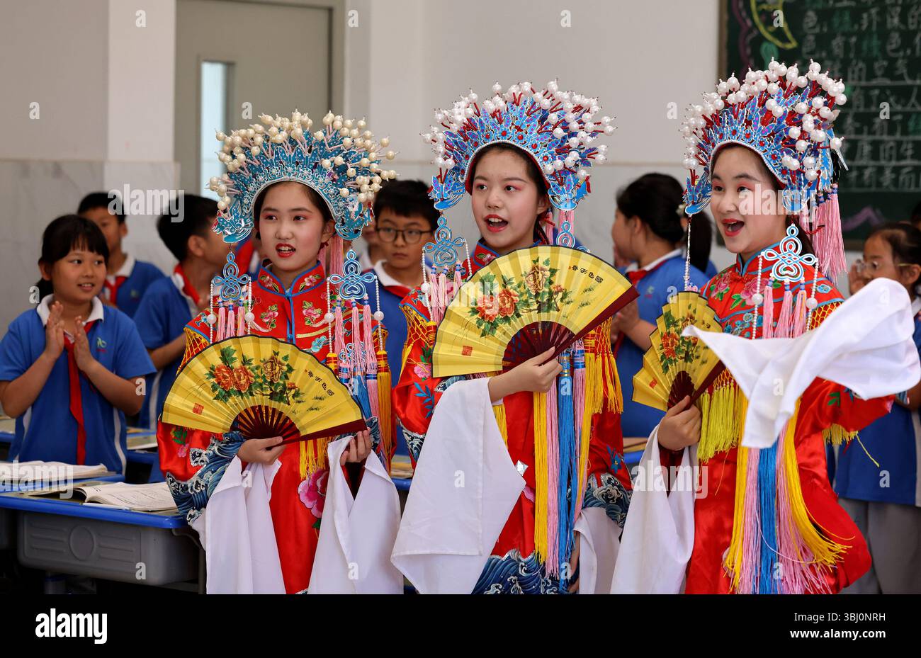 Zaozhuang, China. 12th June, 2025. Students of the Peking Opera club ...