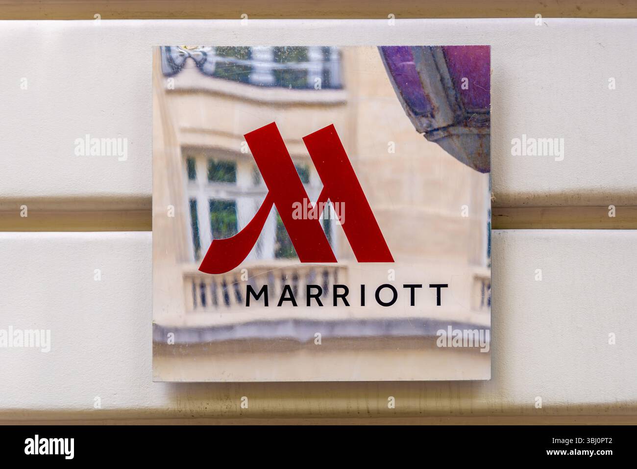Sign and logo at the entrance to a Marriott hotel. Marriott ...