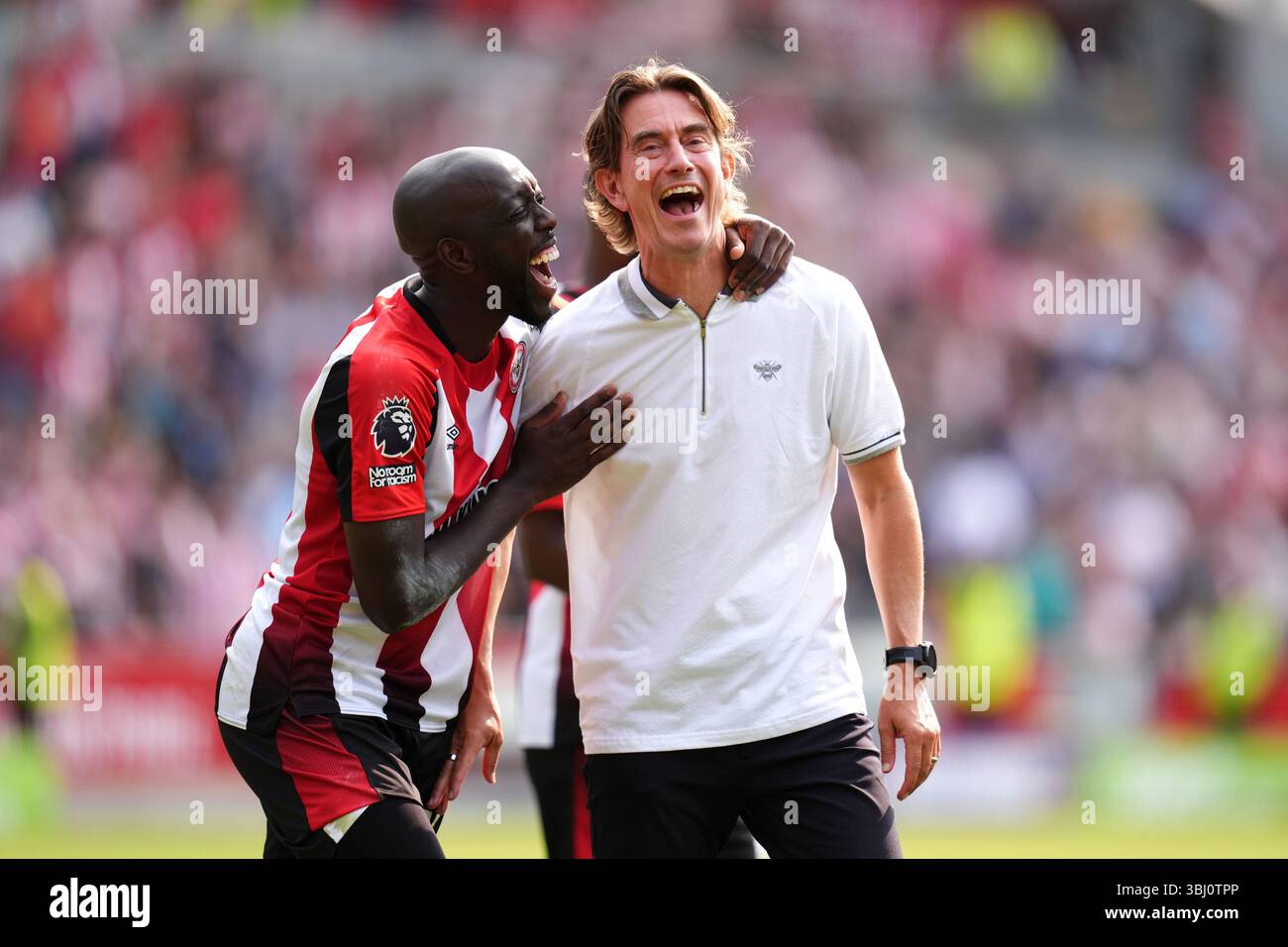 File photo dated 18/08/24 of Thomas Frank with Yoane Wissa. Tottenham ...