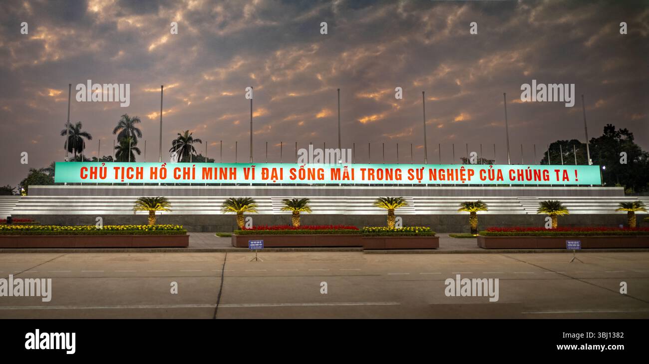 A large communist propaganda slogan reading "Great President Ho Chi ...