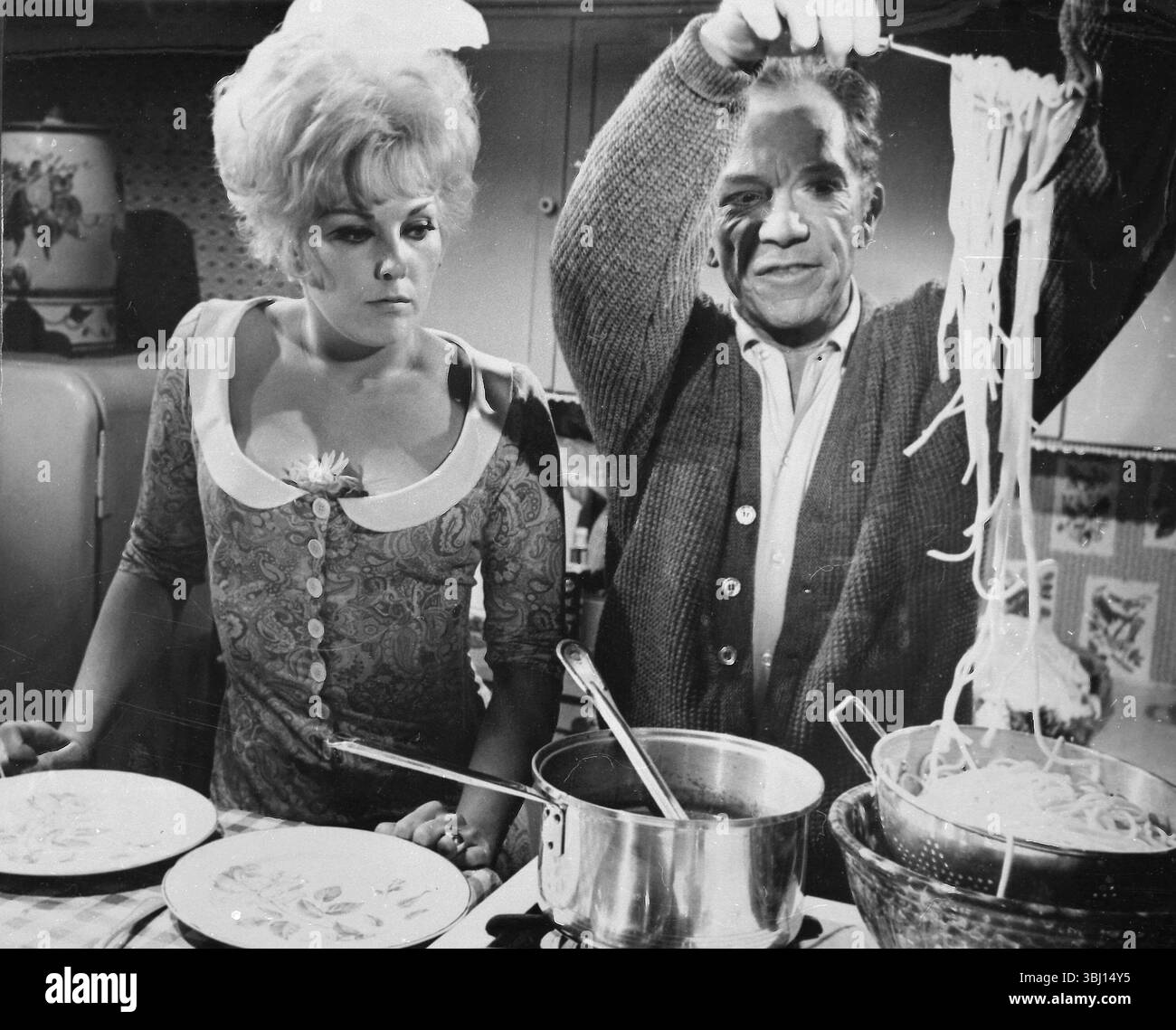 Actress Kim Novak and actor Ray Walston in the movie Kiss Me, Stupid ...