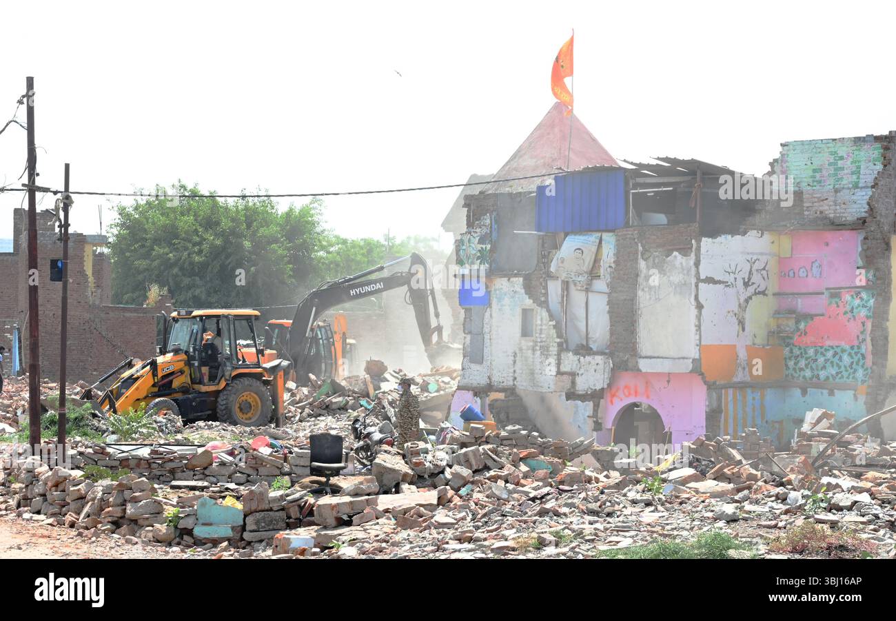 A demolition drive underway at South Delhi's Kalkaji Colony's Bhoomihin ...