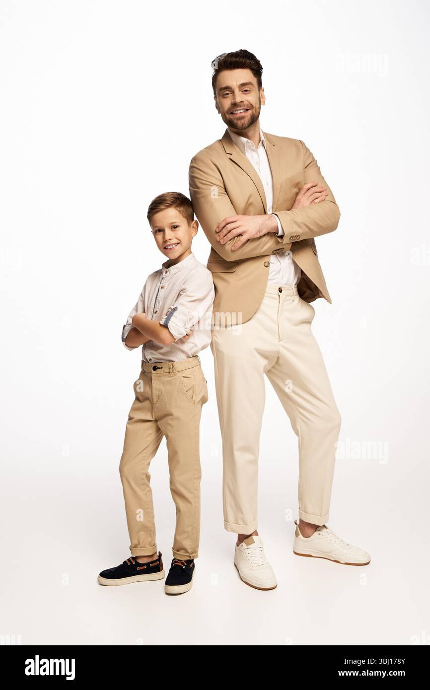A father and son joyfully pose together, showcasing their bond and ...