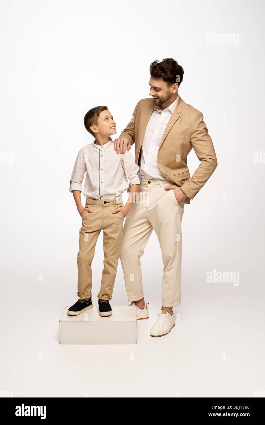 A joyful father and son share a special moment, showcasing love and ...