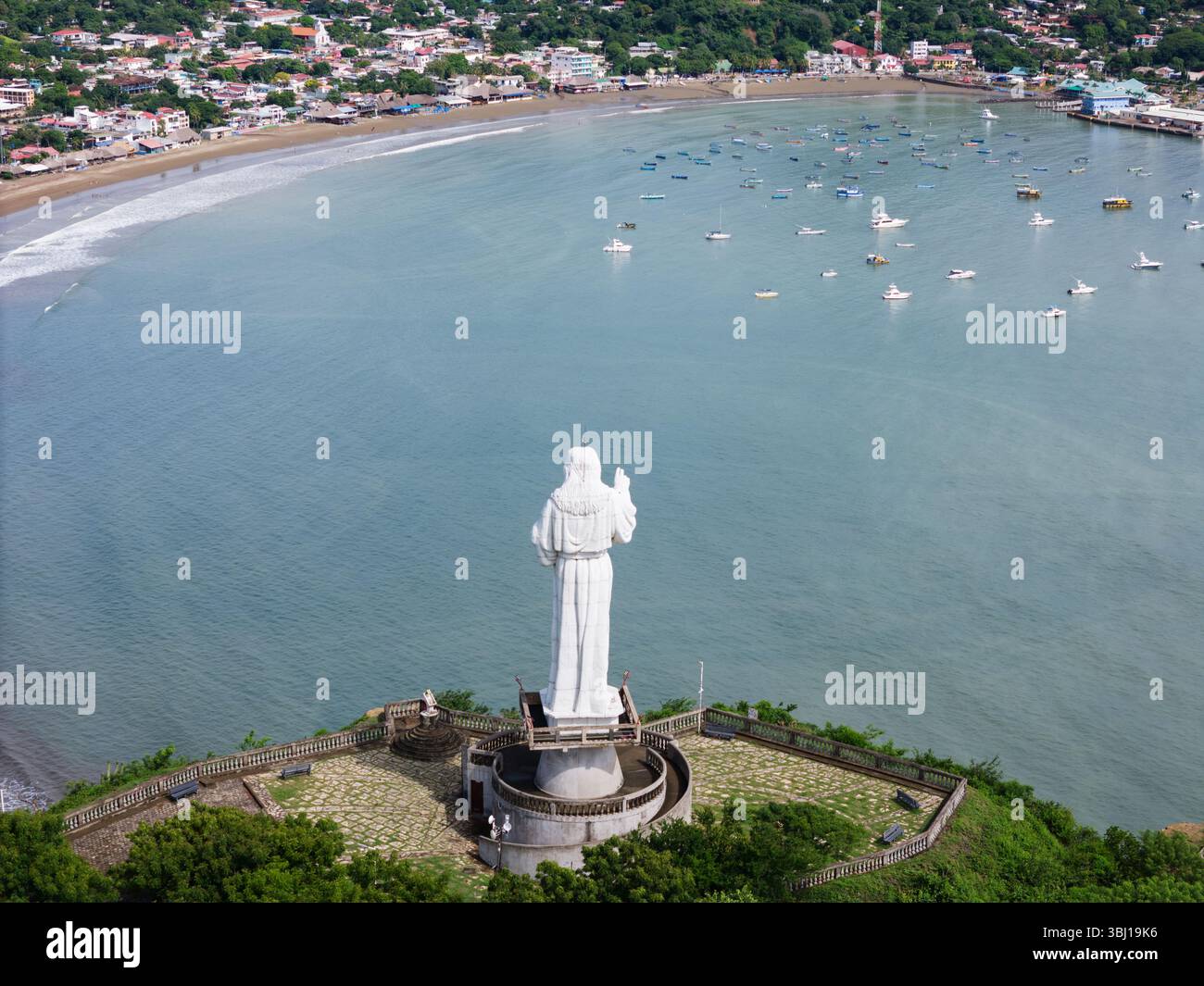 Statue of Jesus in San Juan Del Sur on bay background aerial drone view ...