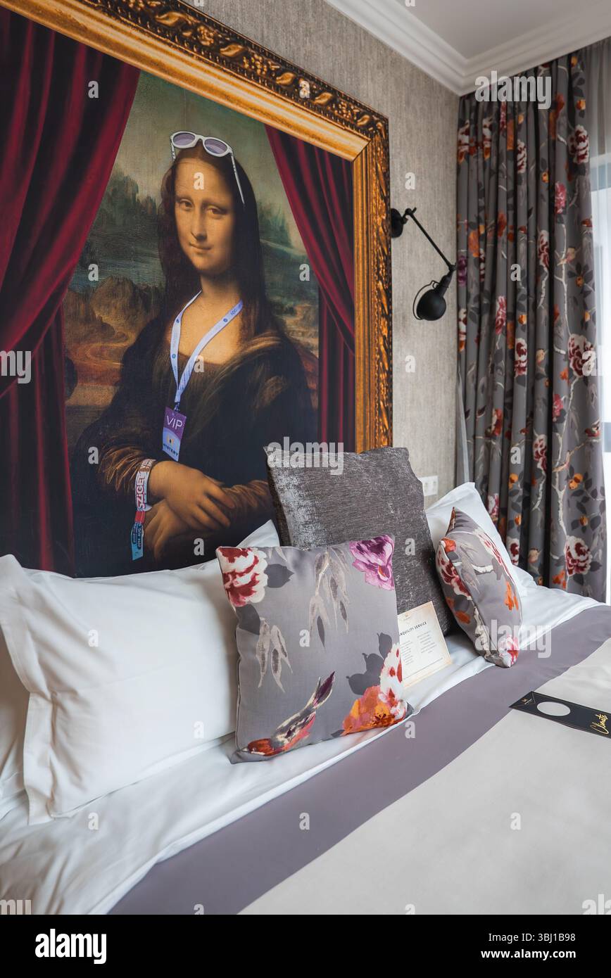 Stylish Hotel Room with Mona Lisa Artwork and Modern Decor Stock Photo ...