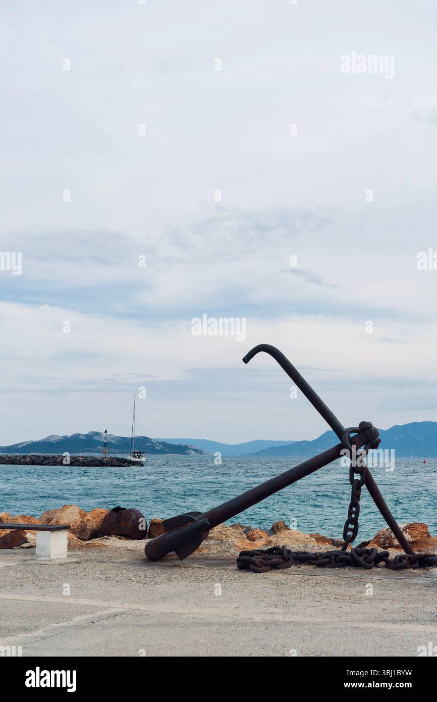 Rustic Anchor Display Against Coastal Horizon Stock Photo - Alamy