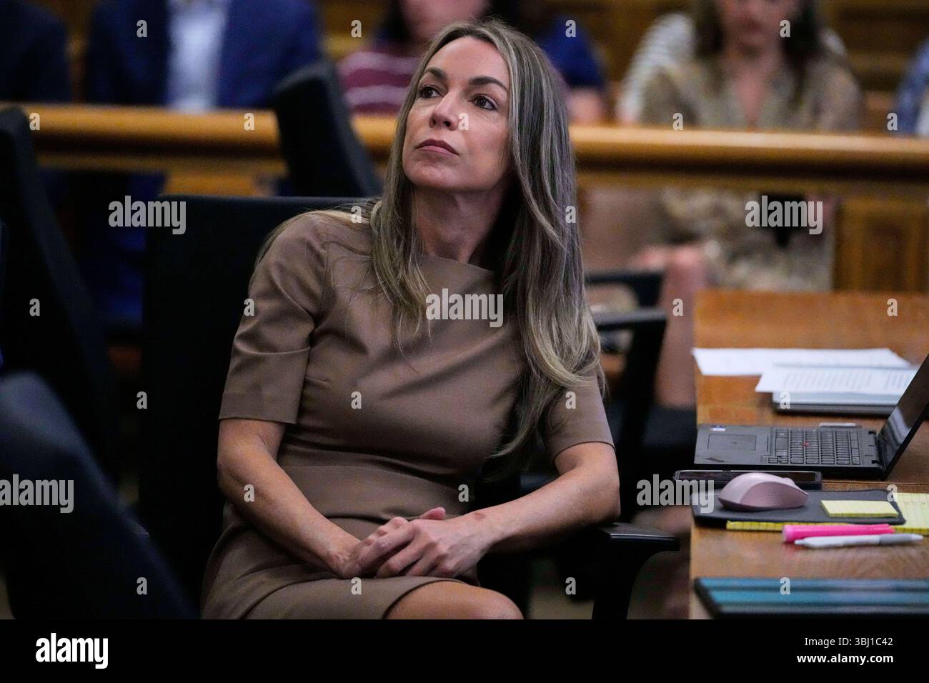 Karen Read listens to her attorney, David Yannetti, address Judge ...