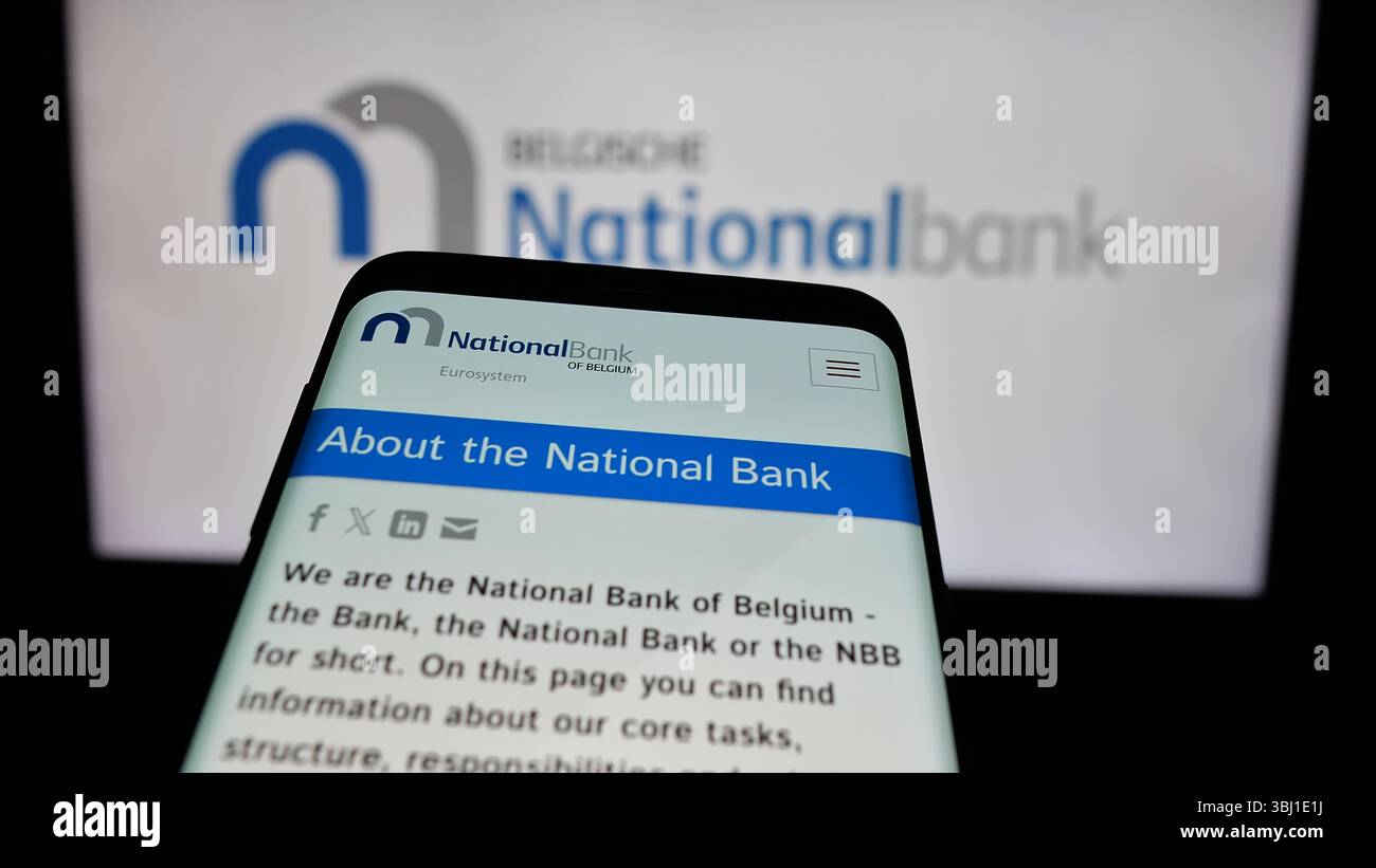 Stuttgart, Germany - 03-21-2025: Mobile phone with website of Belgian Nationale Bank van Belgie ...