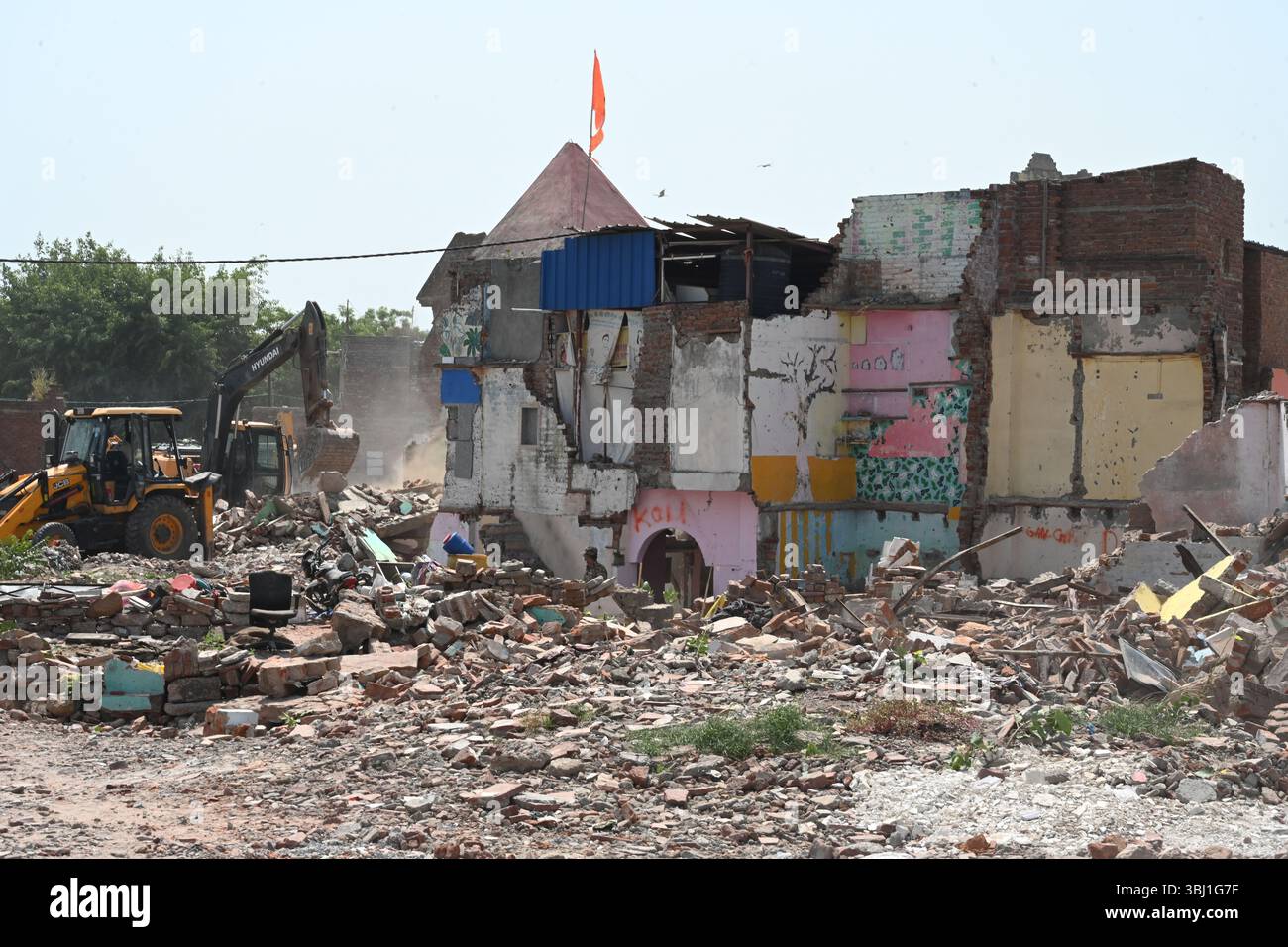 6/11/2025 A demolition drive underway at South Delhi's Kalkaji Colony's ...