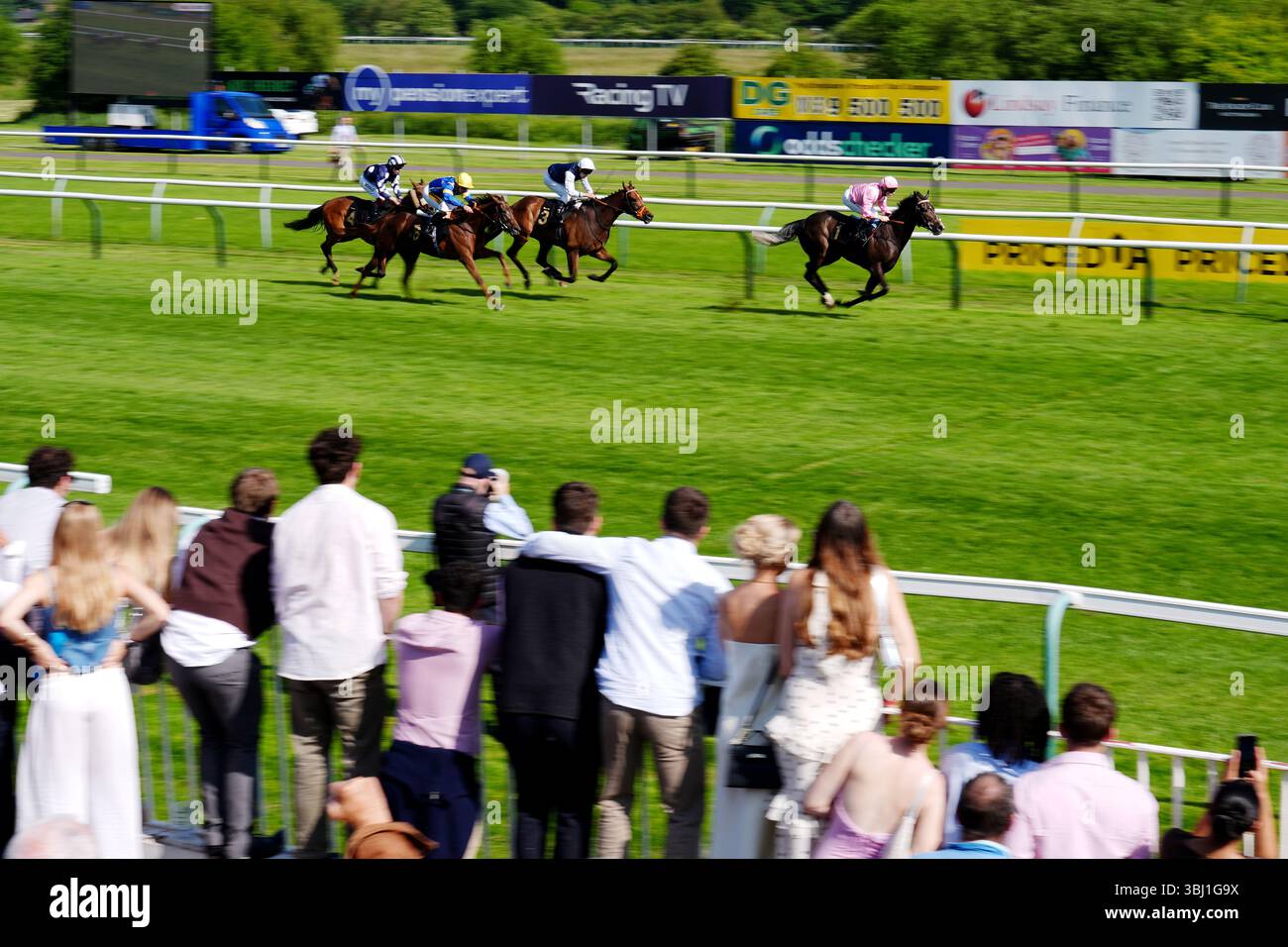 Bellator Bullet ridden by Rowan Scott (right) wins the PricedUp Bet Handicap at Nottingham ...