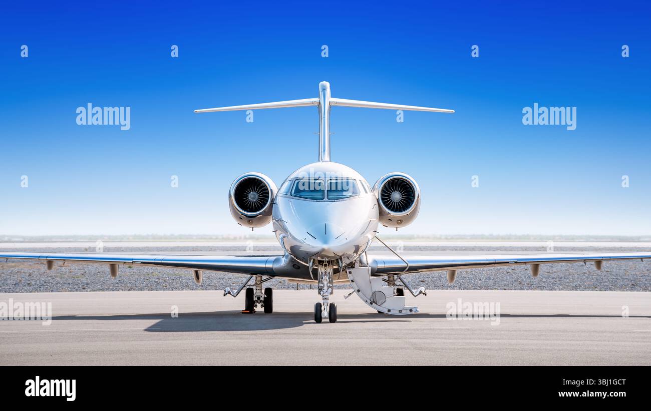 Private jet ready for boarding against a blue sky Stock Photo - Alamy